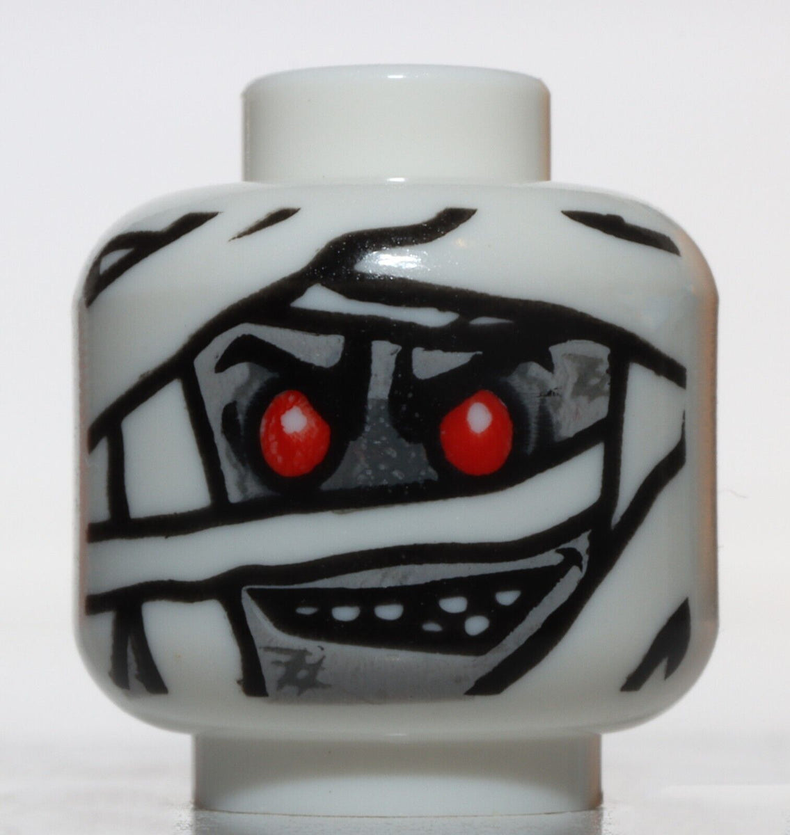 Lego White Minifig Head with Red Eyes Mummy Wrap Pattern – Gems In the ...